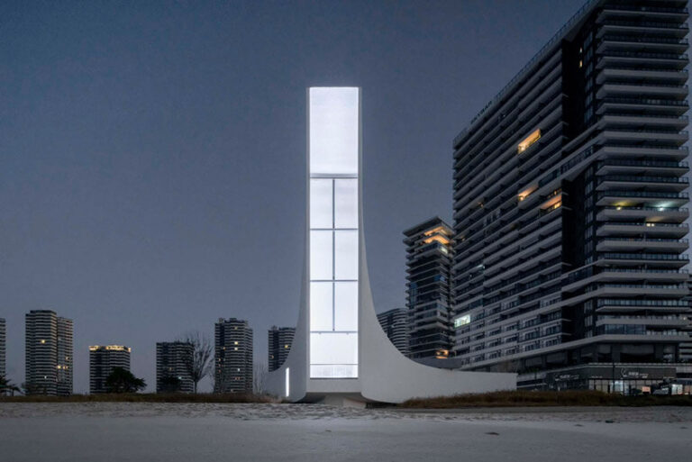 this chapel by o-office emerges as a floating pillar of light over ...
