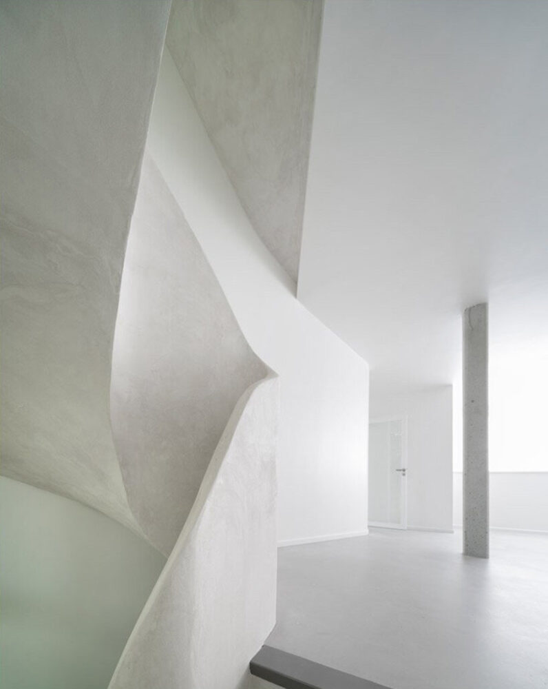 avignon architecte builds 'twist' house with sculptural staircase in ...