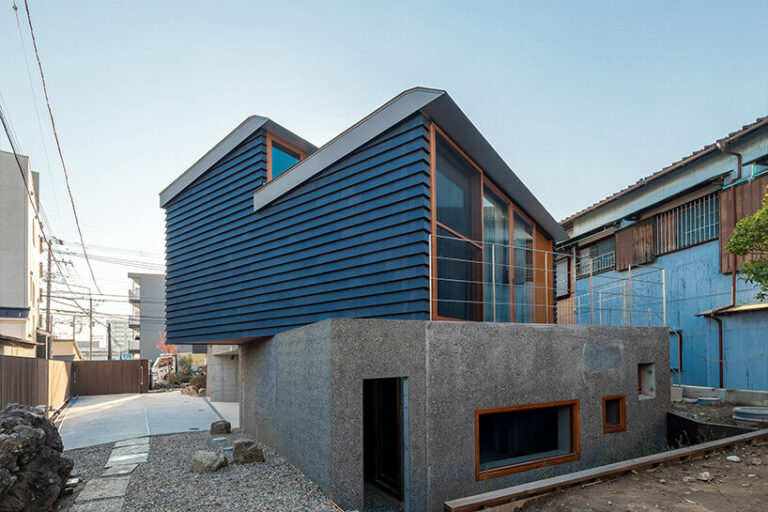 seven staggered volumes by KOMPAS accommodate family house and gallery ...