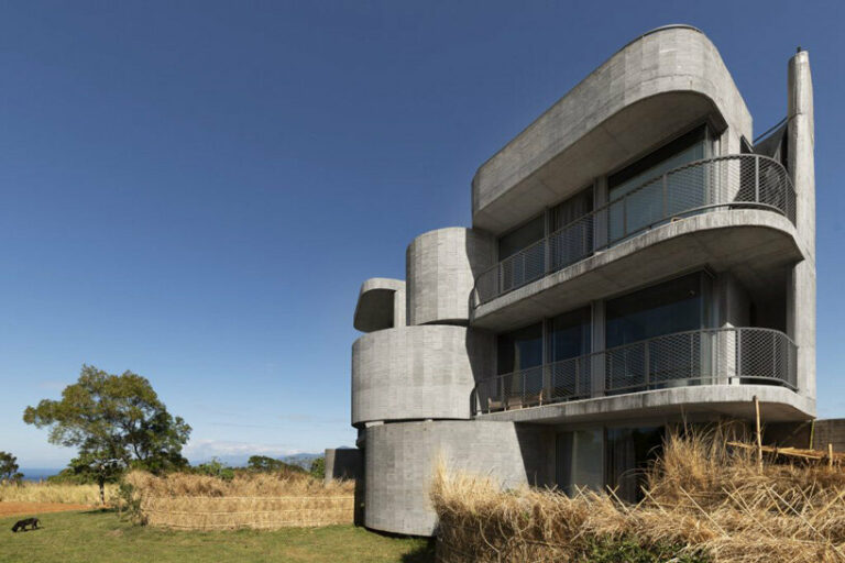 curvaceous concrete walls compose XRANGE architects' remote retreat in ...