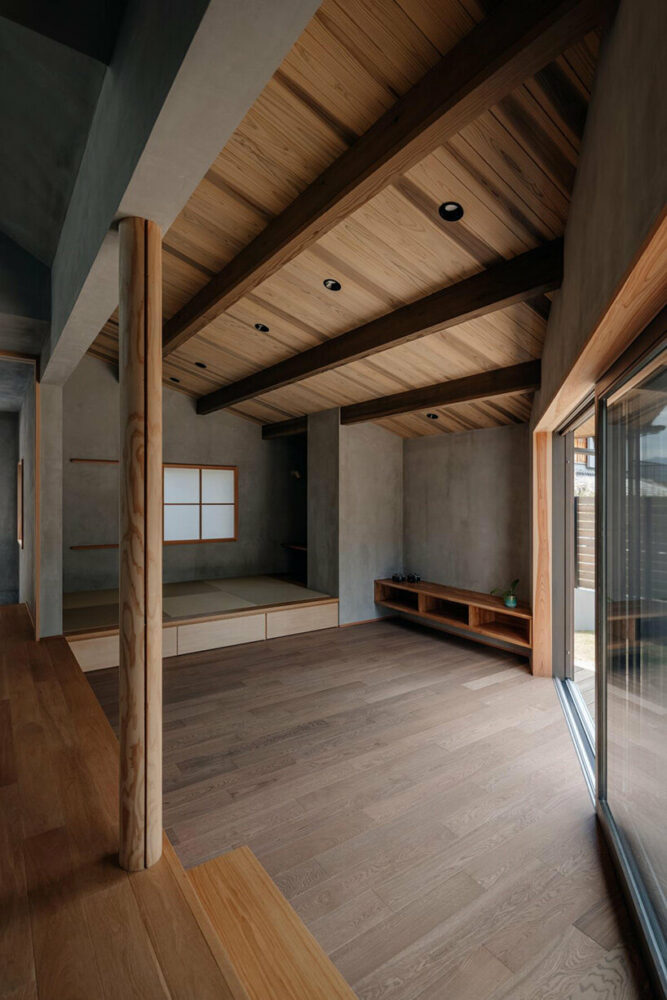 hearth architects' house in japan blends concrete with timber touches