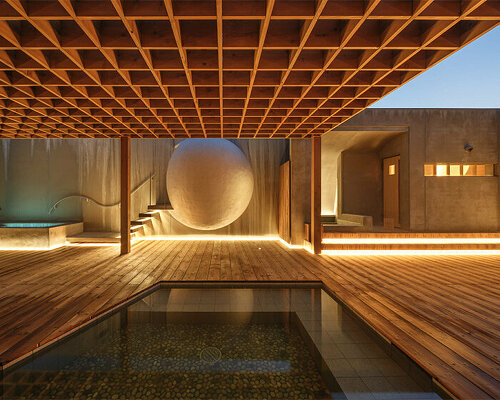 kubo tsushima places minimalist public toilet in a japanese parking lot