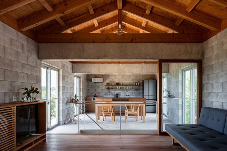 KKAA TYAA tops concrete 'house of joy' with warm timber roof