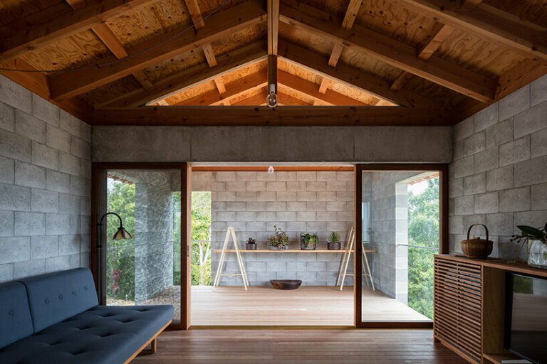 KKAA TYAA tops concrete 'house of joy' with warm timber roof