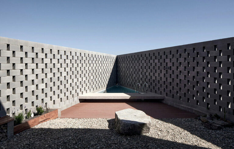 this cinder block 'LBS house' opens broadly over the coastal cliffs of ...