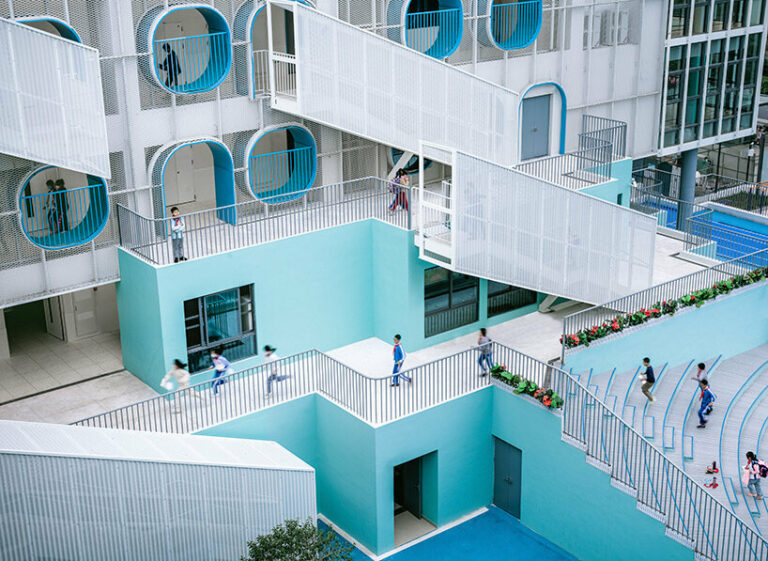 glass classrooms and learning terraces encourage interaction within PAO ...