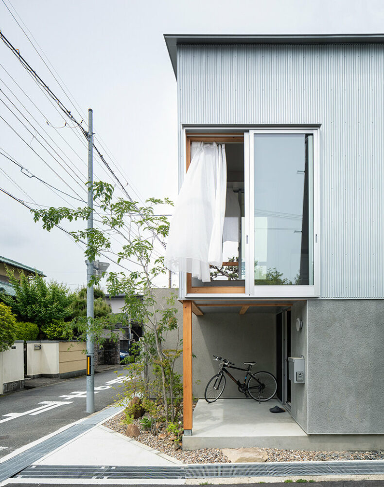 this composite house in osaka incorporates the diversity of its ...
