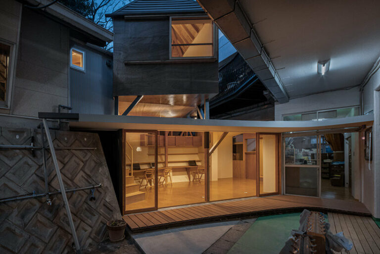 maki yoshimura builds nursery extension between two retaining walls in ...