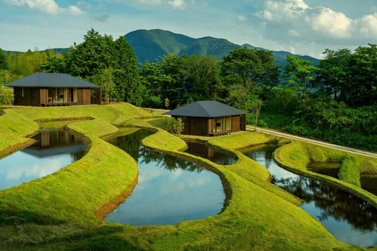 kengo kuma scatters hot spring hotel across sculpted rice terraces