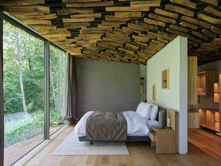 kengo kuma's firewood roof for 'snow peak' spa resort echoes mountain ...