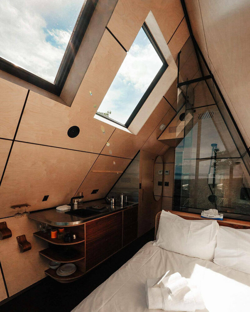 UHU micro-cabin on stilts rises from the ground to offer generous river views in canada | ARCHCOD