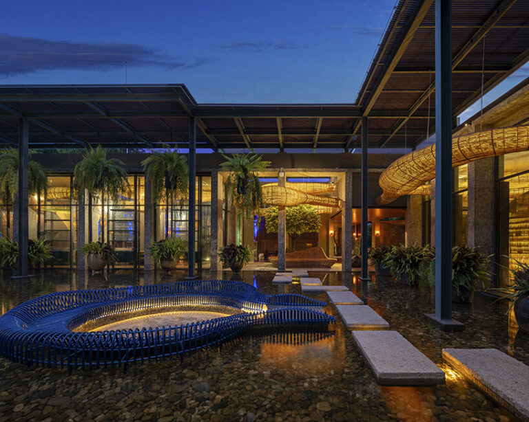 with undulating rattan, enter projects transforms thai art gallery