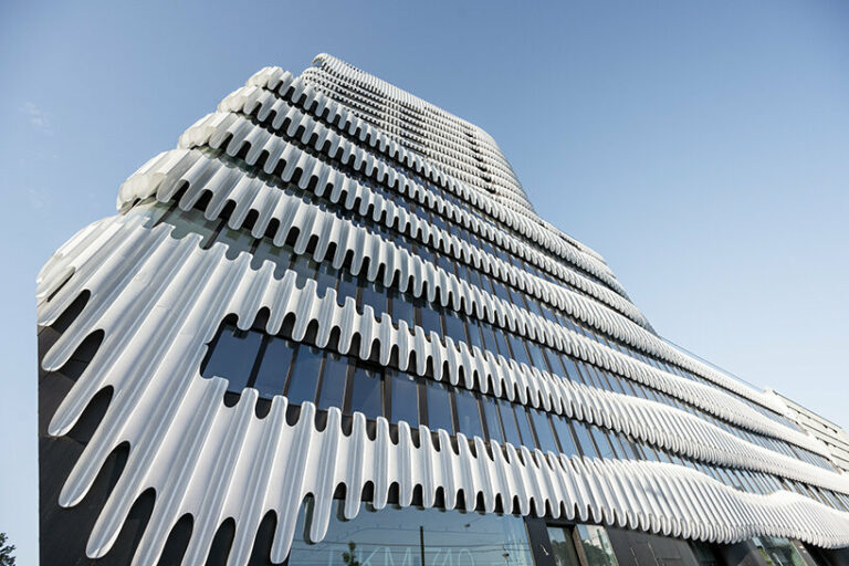 j. mayer h. wraps its newly completed tower with a 'zipper' facade