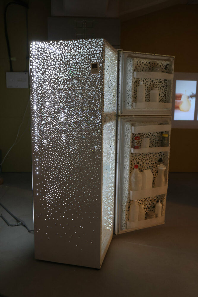 nina nomura crafts artfully perforated landscape by melting holes into ...