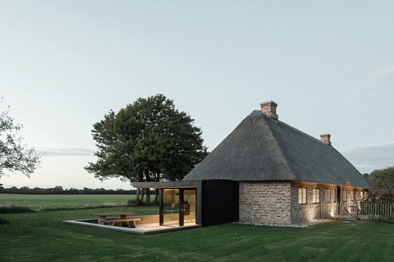 thatched brick 'nieby crofters cottage' revived with glass renovation