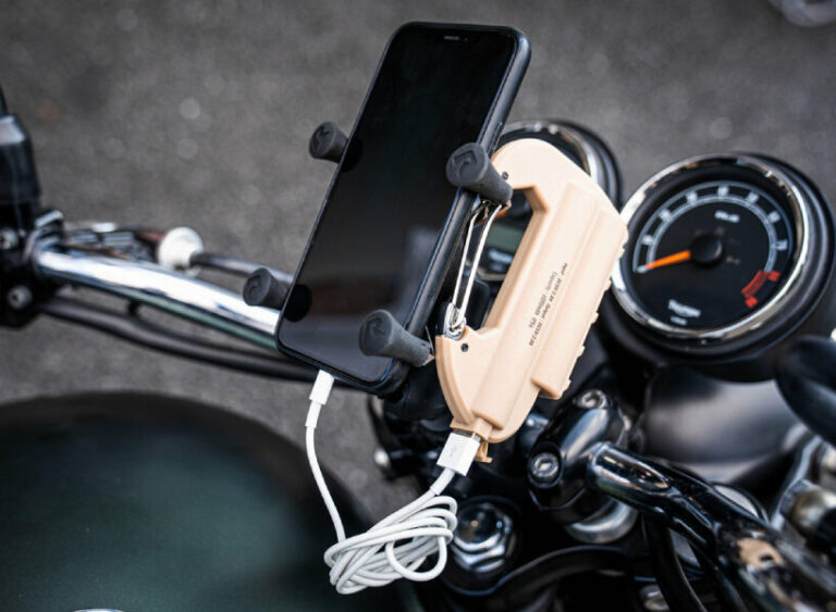 portable power bank clips on belt loops, bikes, and bags like a carabiner