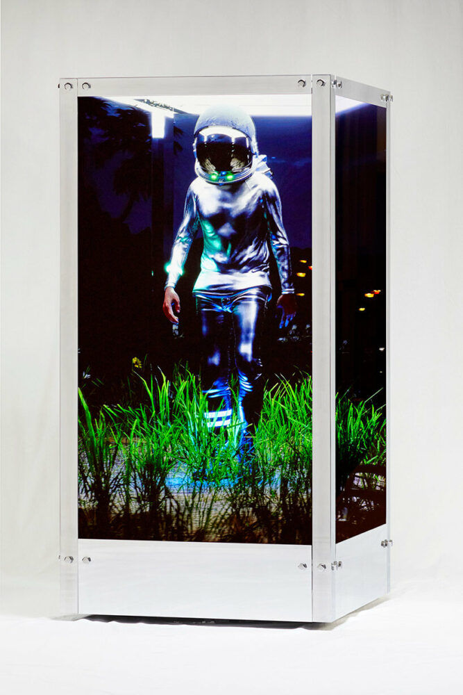 beeple's kinetic sculpture at M+ museum depicts an astronaut on an ...