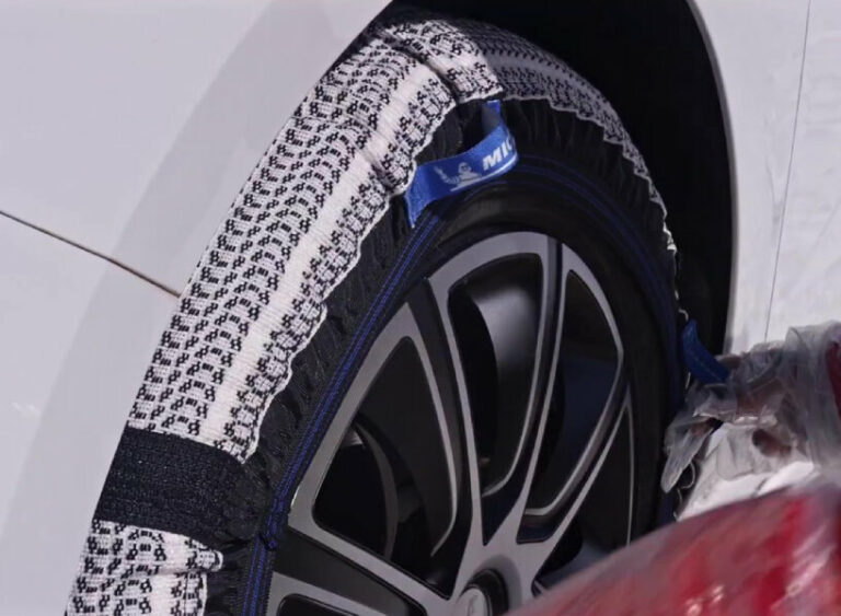'michelin SOS grip' tire socks stop cars from tumbling on snowy roads