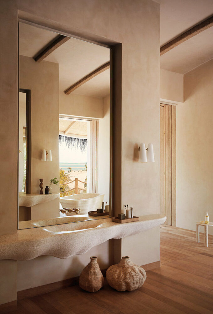 'kisawa' resort weaves undulating thatched-roof villas into the sand ...