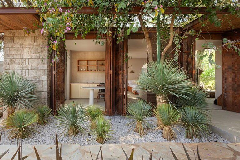 perforated louvers in corten steel clad getaway cabin in brazil