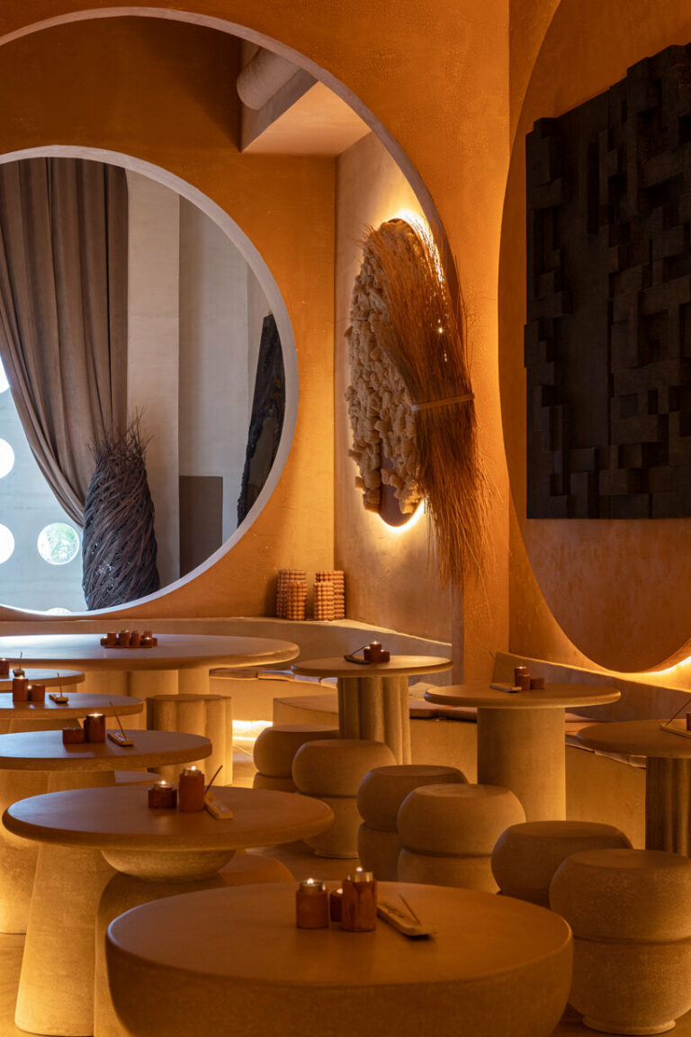 natural textures & earth tones wrap cavernous la nena cafe in dubai