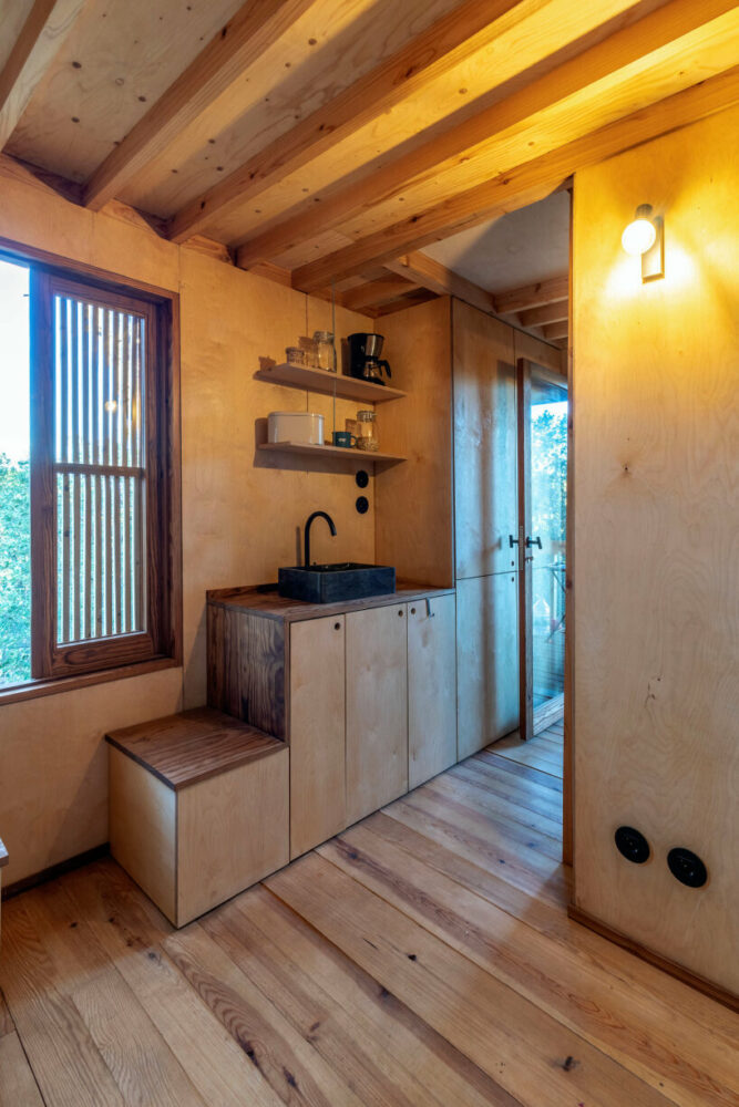 madeiguincho tops wooden shack 'columba' with skylight in sunshine ...