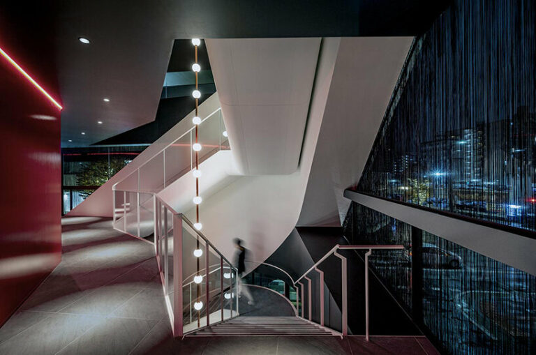 stainless steel curtains gently wrap around japan's 010 BUILDING