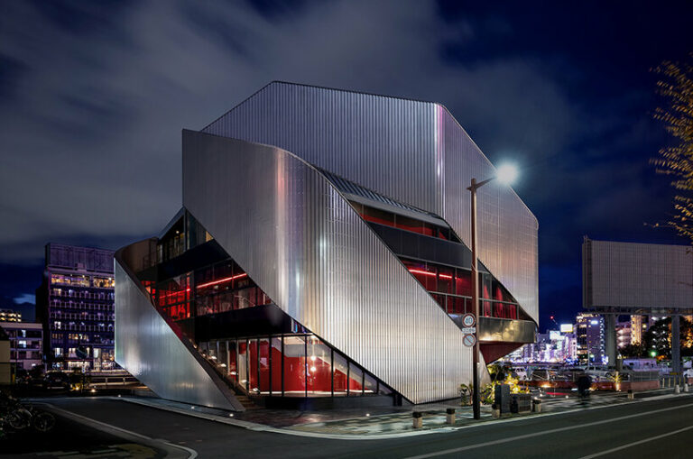 stainless steel curtains gently wrap around japan's 010 BUILDING