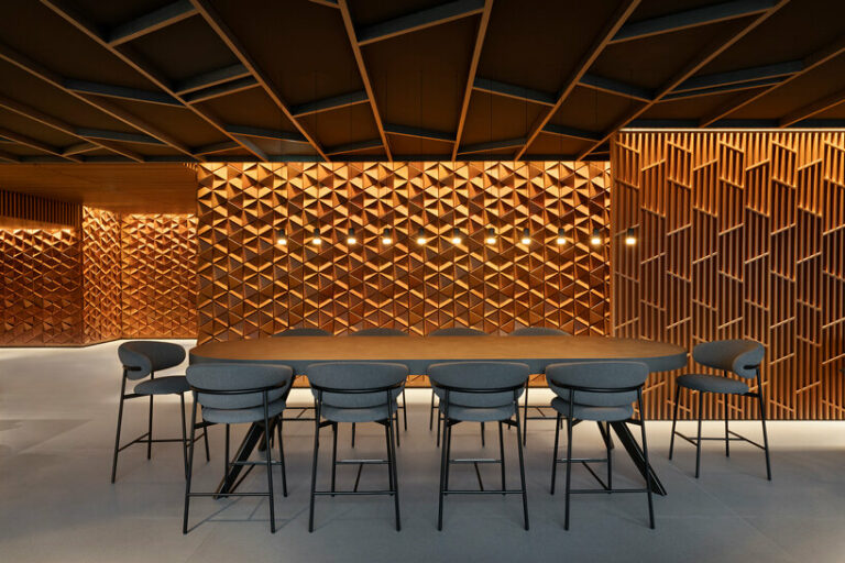 andrea maffei architects clads milan's DAV restaurant interior in pyramid wooden panelling