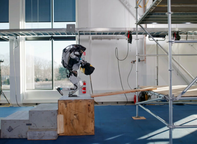 boston dynamics' humanoid robot 'atlas' effortlessly helps on ...