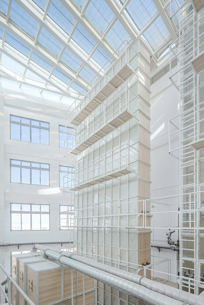 greater dog architects adorns mixed-used building with feather-shaped ...