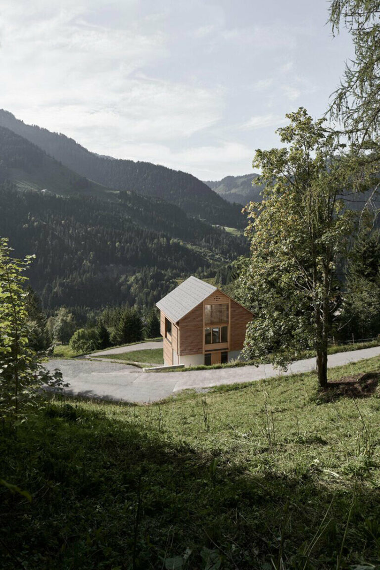 innauer matt perches secluded timber house along mountainous landscape ...