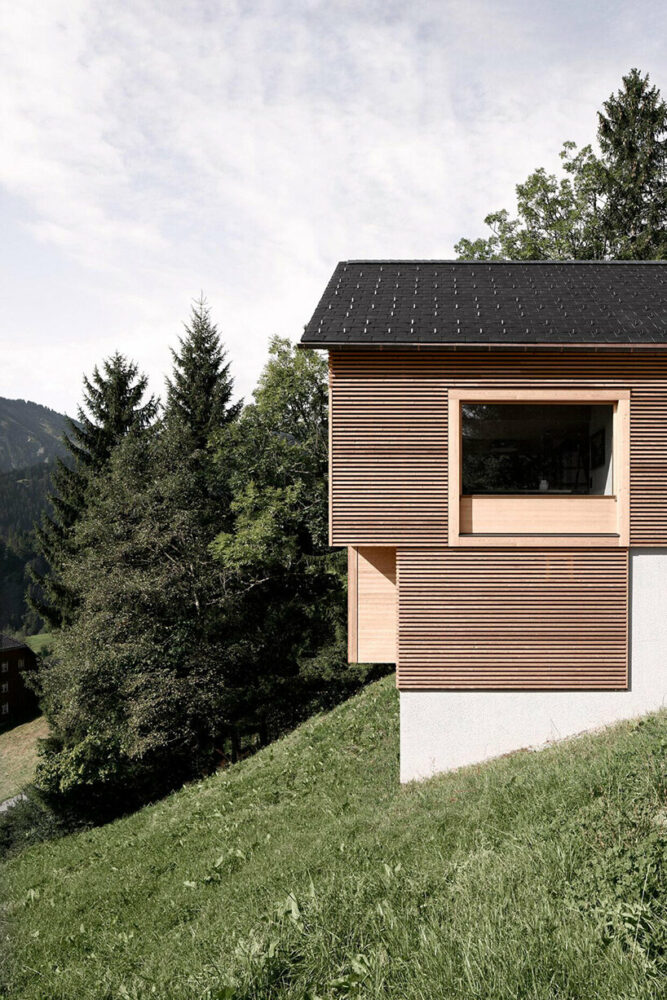 innauer matt perches secluded timber house along mountainous landscape ...