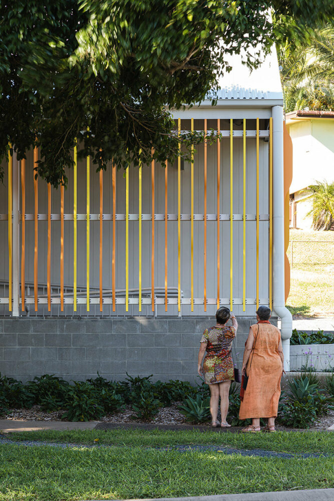 colorful timber screen with hidden morse code message decorates art ...