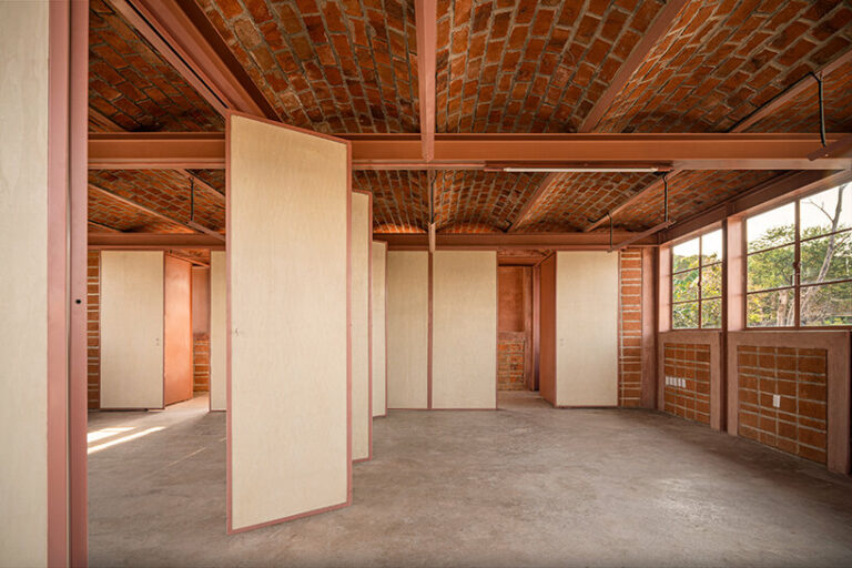 vaulted brickwork community center built by citizens adorns rural mexico