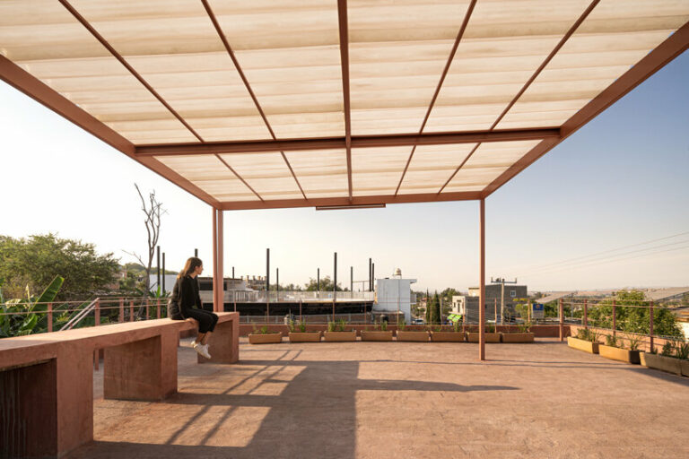 vaulted brickwork community center built by citizens adorns rural mexico