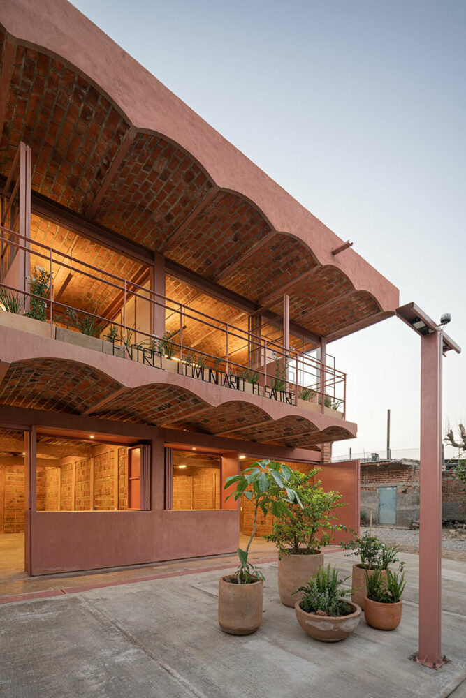 vaulted brickwork community center built by citizens adorns rural mexico
