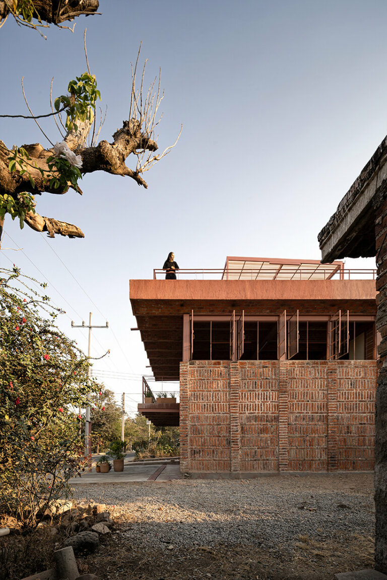 vaulted brickwork community center built by citizens adorns rural mexico