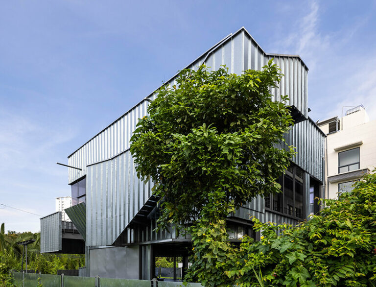 corrugated 'TBD office' by aaaaaa embraces the vietnamese nature