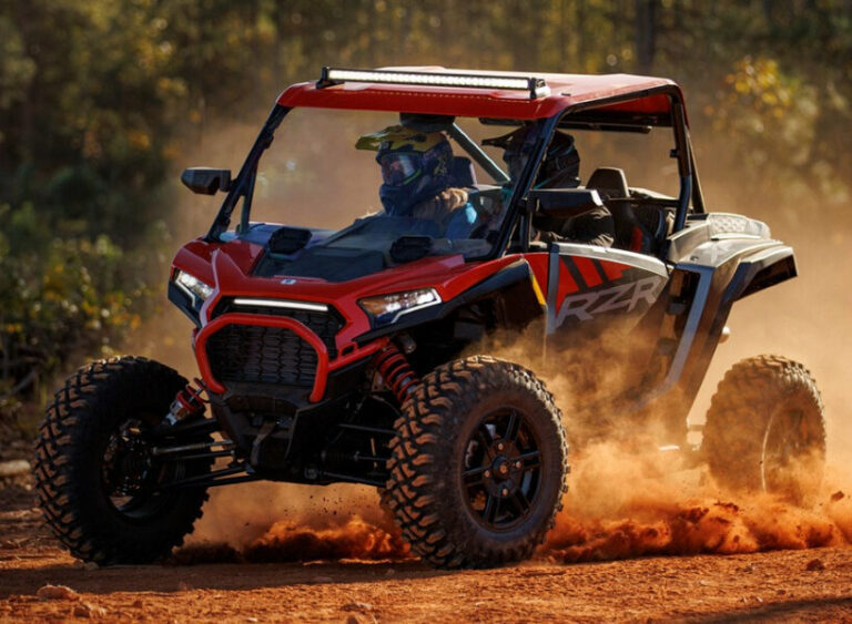 multi-terrain off-roader polaris RZR XP weathers steep hills, rough ...