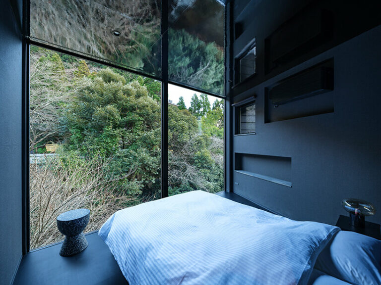 kubo tsushima architects reflects river scenery within hotel in japan