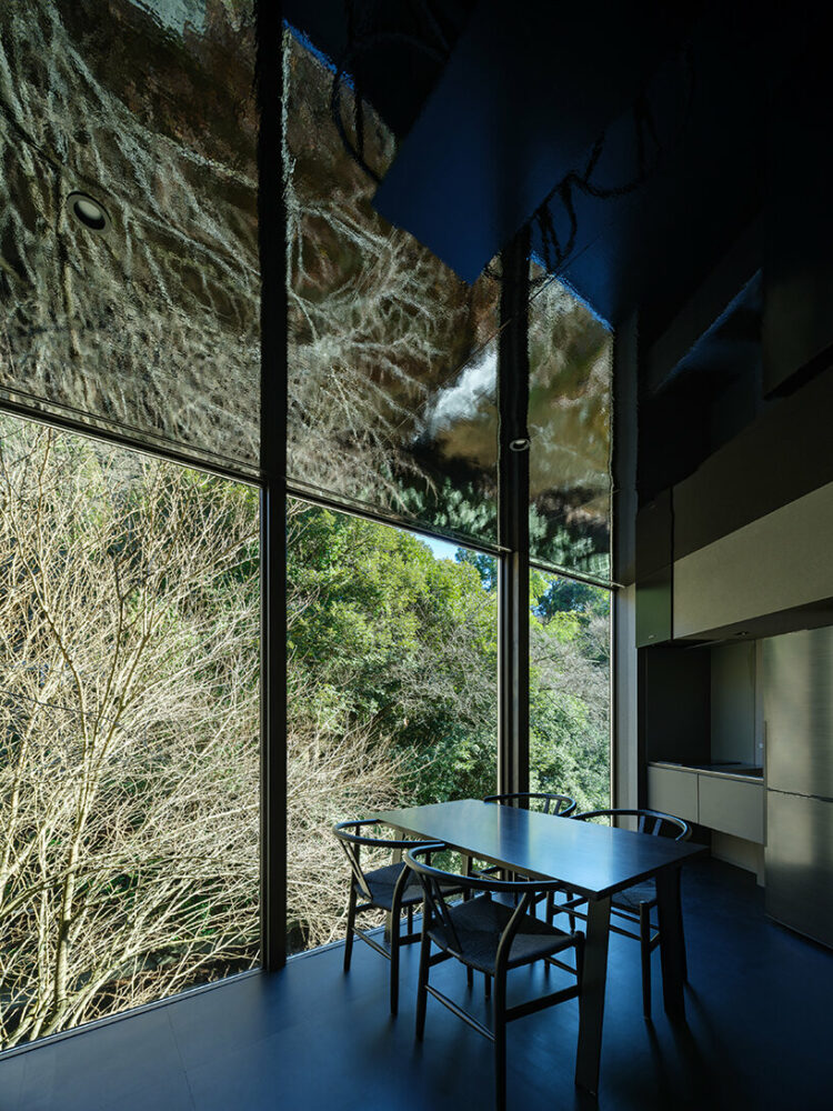 kubo tsushima architects reflects river scenery within hotel in japan