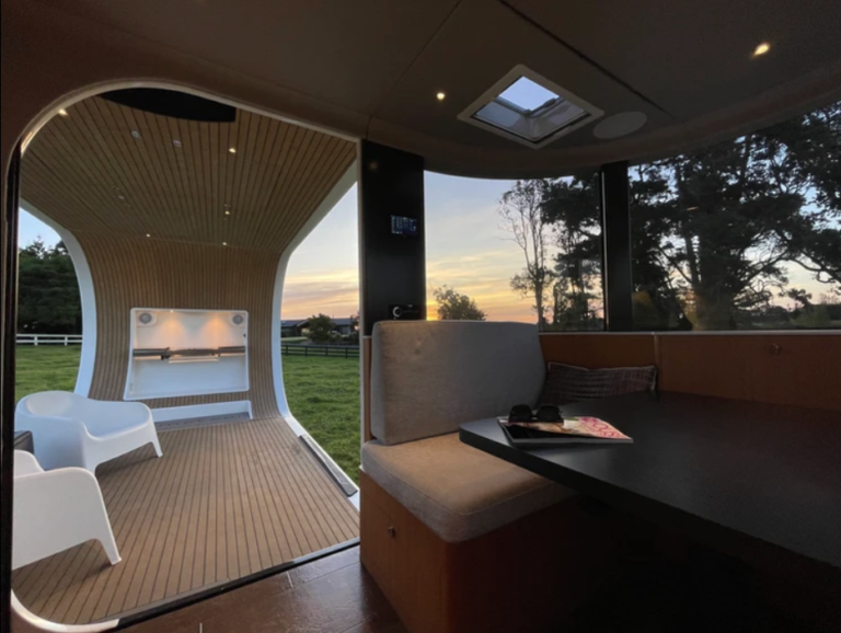 romotow camping trailer swivels out to form spacious deck lounge