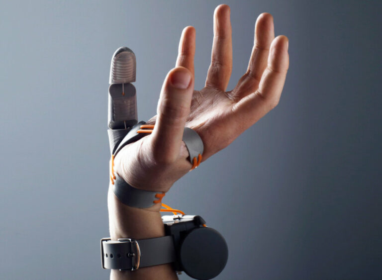 attachable 3D-printed robot thumb grasps objects like a real finger