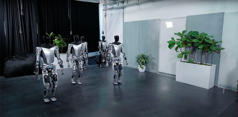 watch the tesla bot walk and pick up stuff without assistance