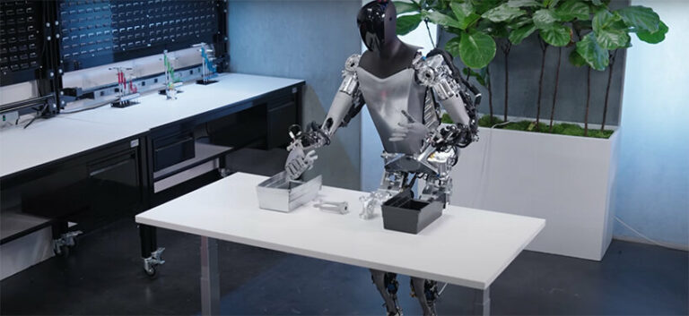 watch the tesla bot walk and pick up stuff without assistance