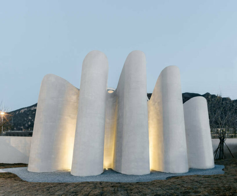 PAO's public restroom meanders around amoeba-shaped concrete structure ...