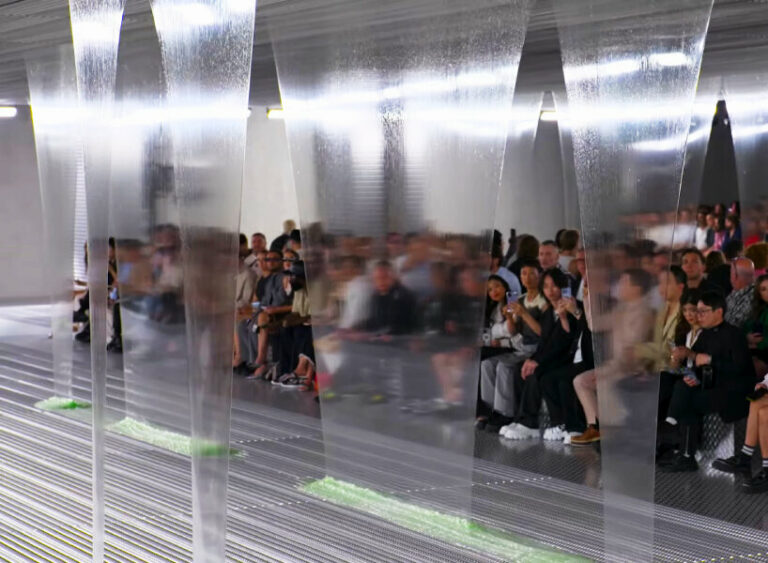 in prada SS24 ‘fluid form’ show, translucent thick slime cascades like luminous resin waterfall
