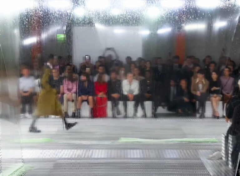 in prada SS24 ‘fluid form’ show, translucent thick slime cascades like luminous resin waterfall