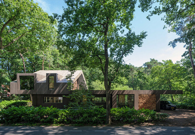 protruding windows bring nature inside spee architecten's sustainable ...